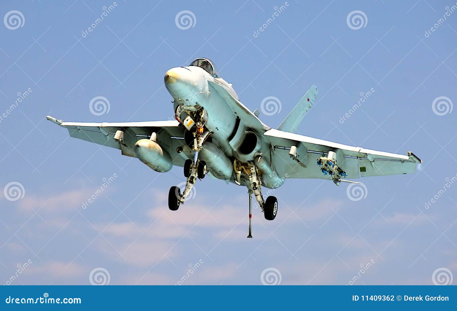 F-18 Hornet Landing on Aircraft Carrier Stock Photo - Image of guns ...