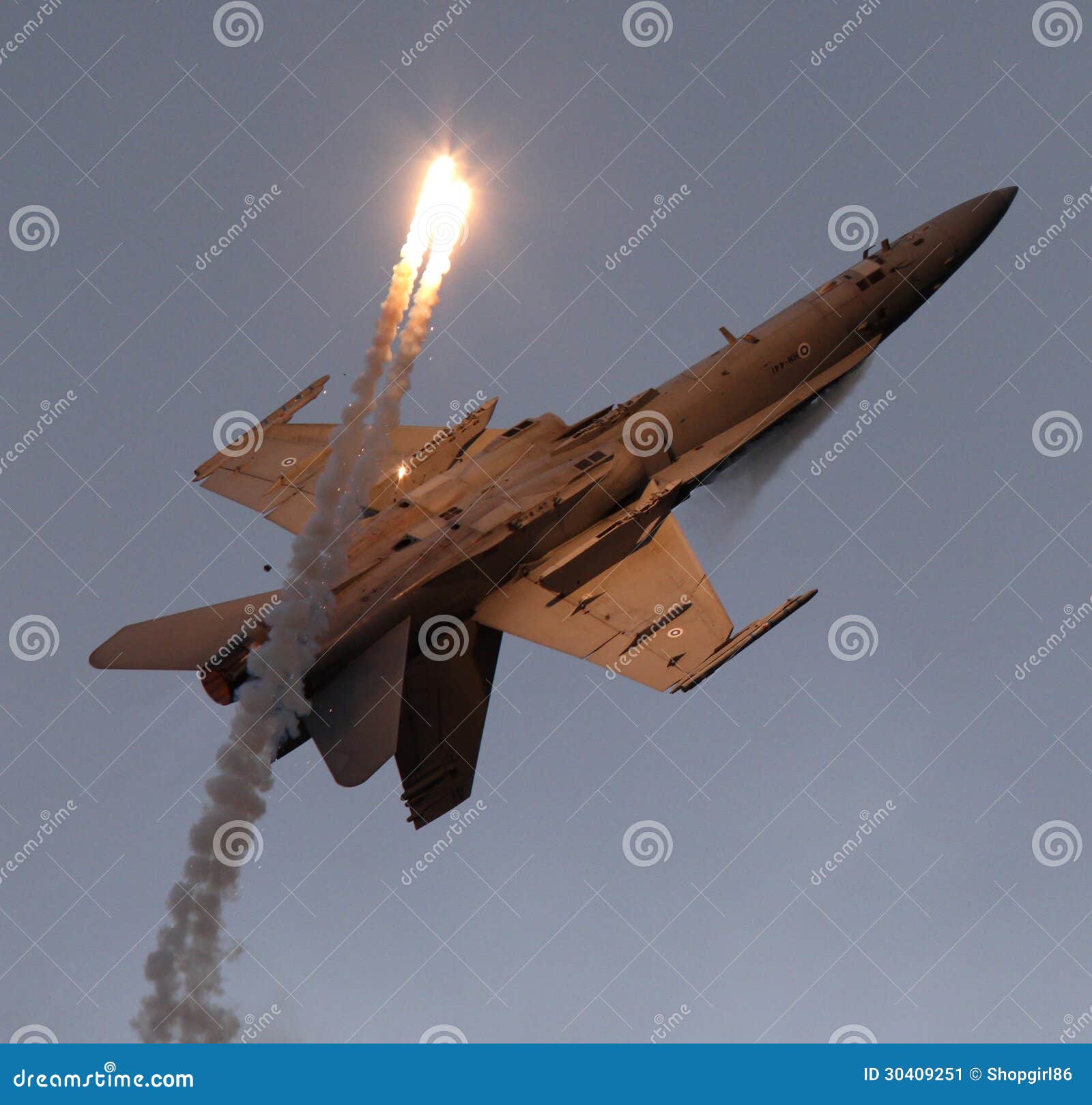 F-18 on back with flares editorial photo. Image of airshow - 30409251