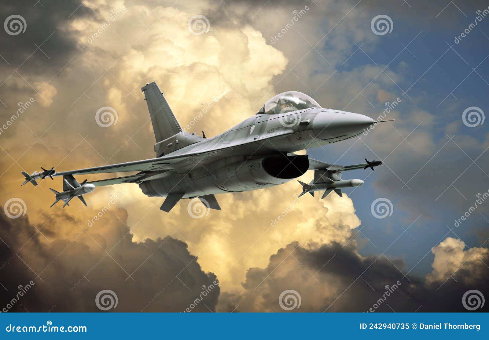 F-16 Fighting Falcon Fighter Jet Model Against Dramatic Clouds Stock ...