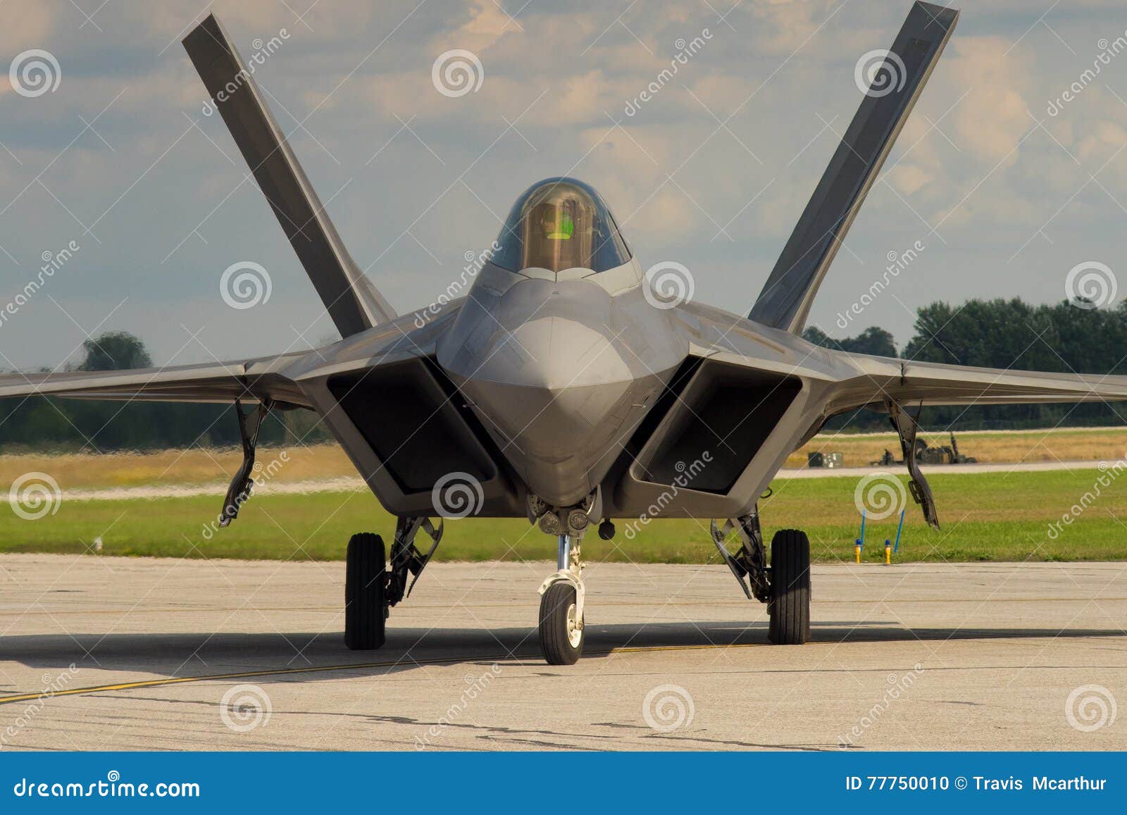 F-22 Raptor on the Runway stock photo. Image of runway - 77750010