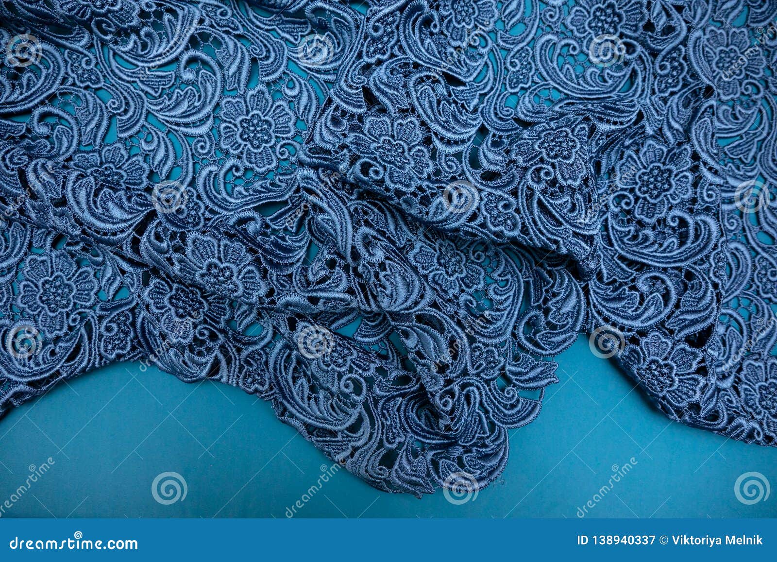 Fabric with Blue Patterns in the Form of Flowers, Spread Out on the ...