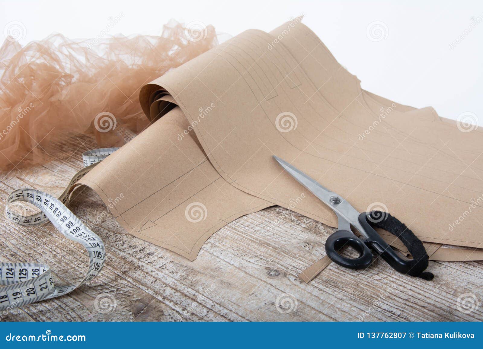 Fabric and Objects for Sewing Clothes. Roulette and Patterns on the ...