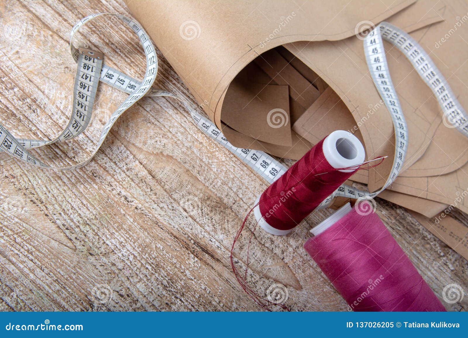 Fabric and Objects for Sewing Clothes. Roulette, Coil, and Patterns on ...