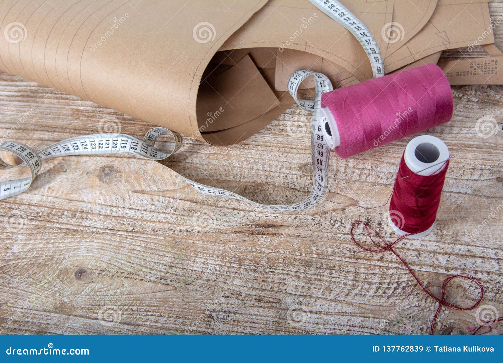 Fabric and Objects for Sewing Clothes. Roulette, Coil, and Patterns on ...