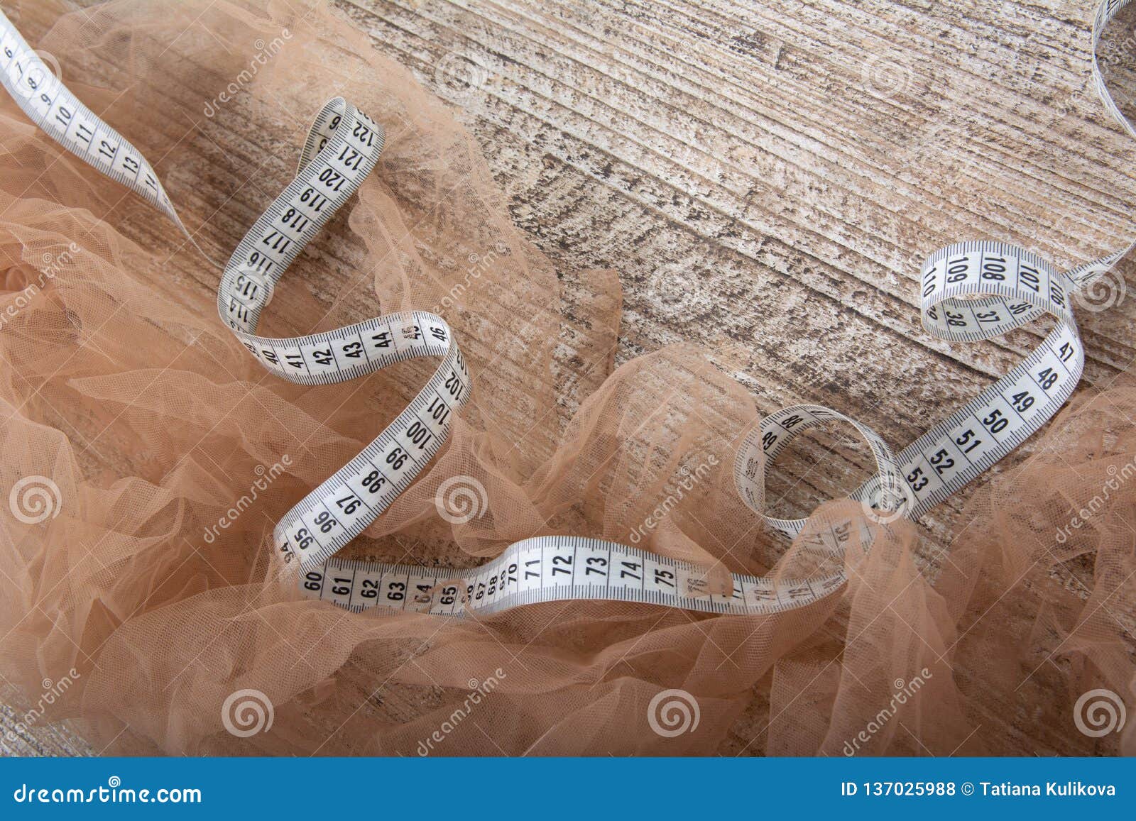 Fabric and Objects for Sewing Clothes. Roulette and Patterns on the ...