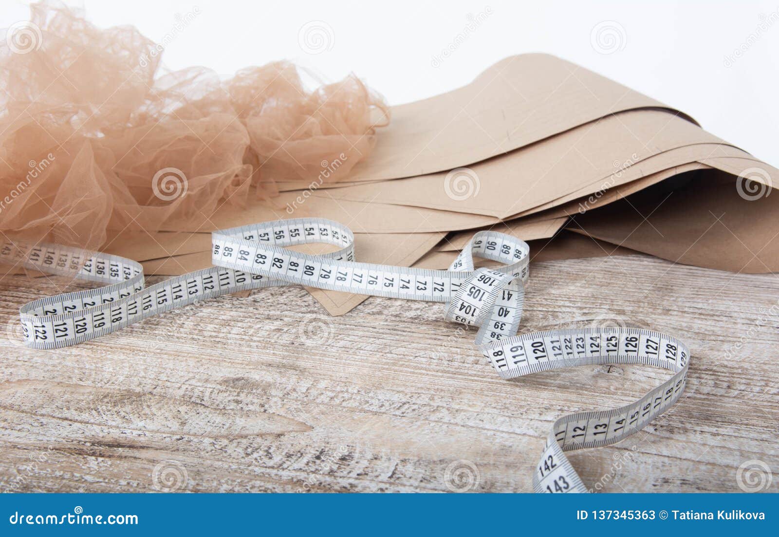 Fabric and Objects for Sewing Clothes. Roulette and Patterns on the ...