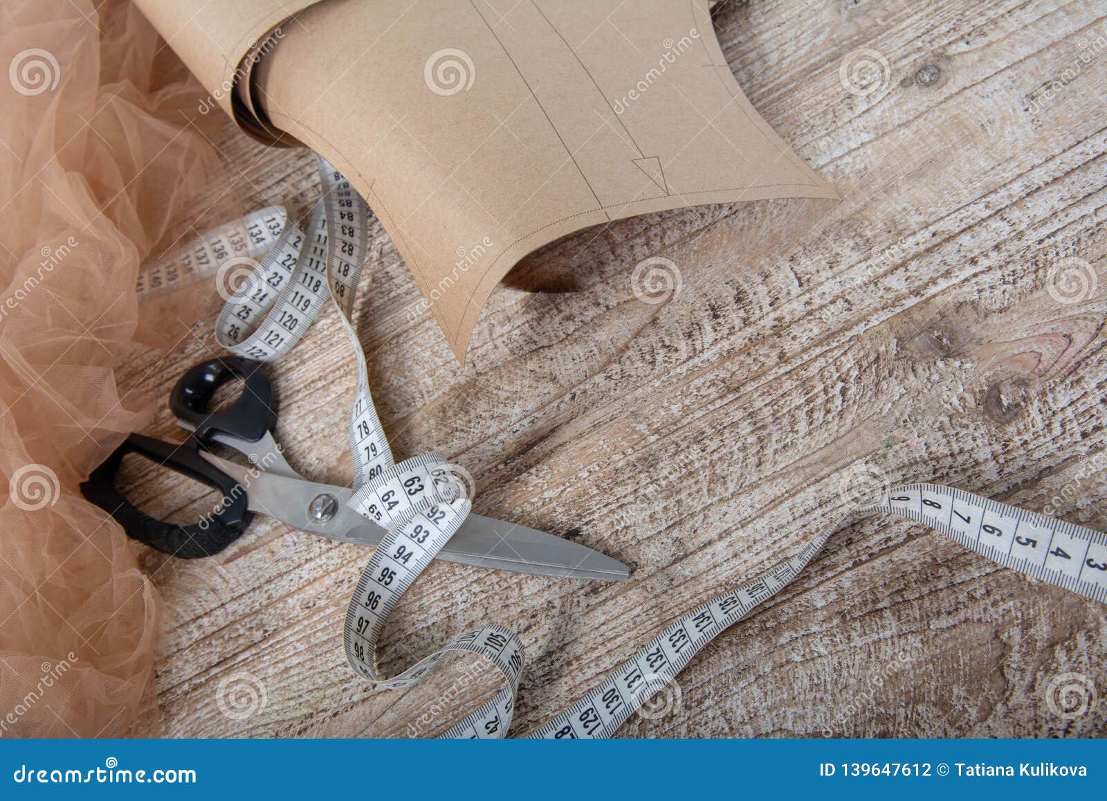 Fabric and Objects for Sewing Clothes. Roulette and Patterns on the ...