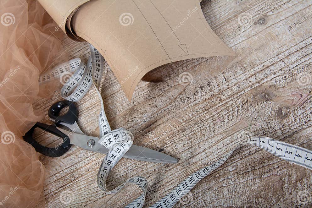 Fabric and Objects for Sewing Clothes. Roulette and Patterns on the ...