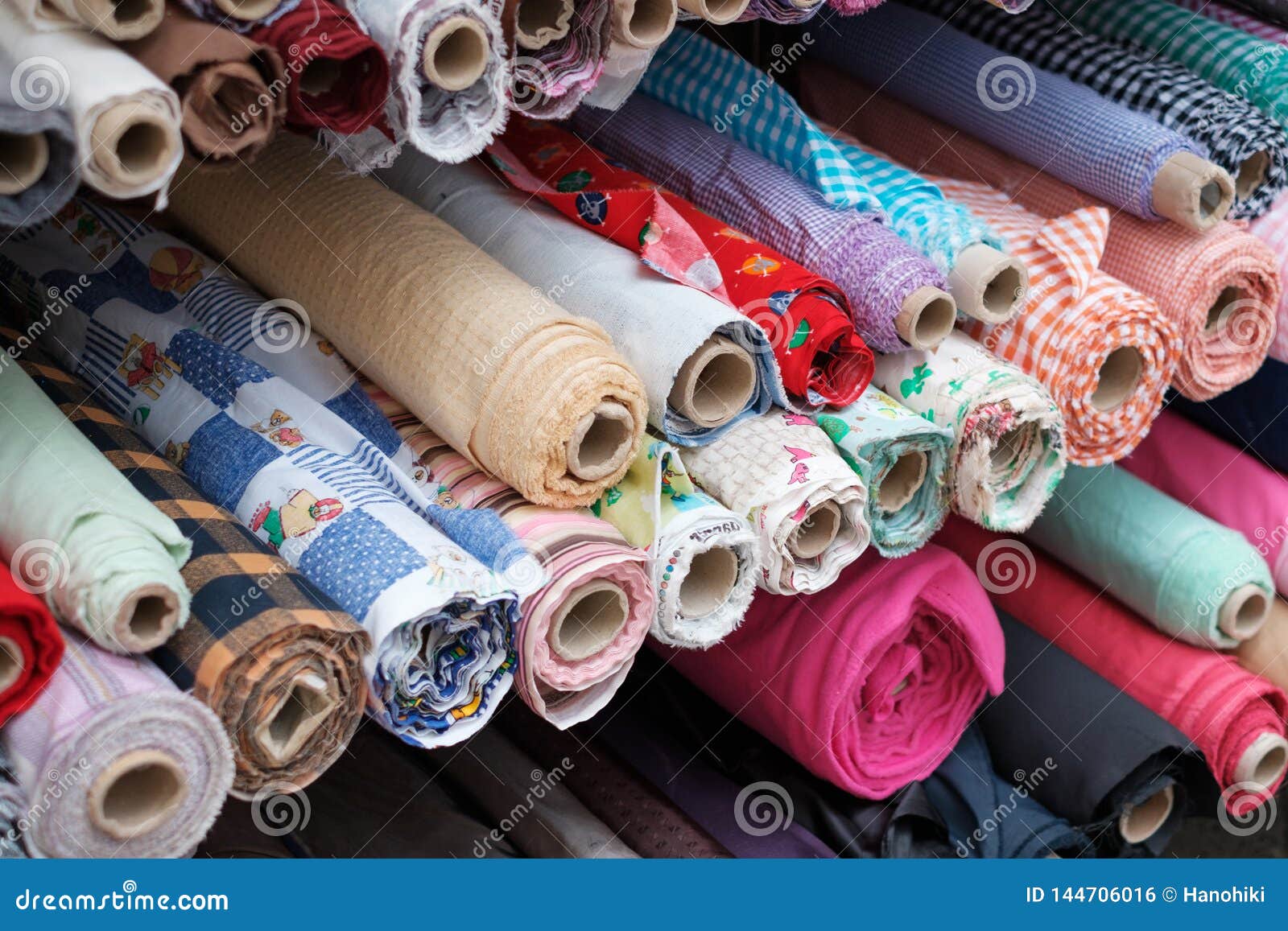 Fabric Rolls and Colorful Textiles on Market Stand Stock Photo - Image ...