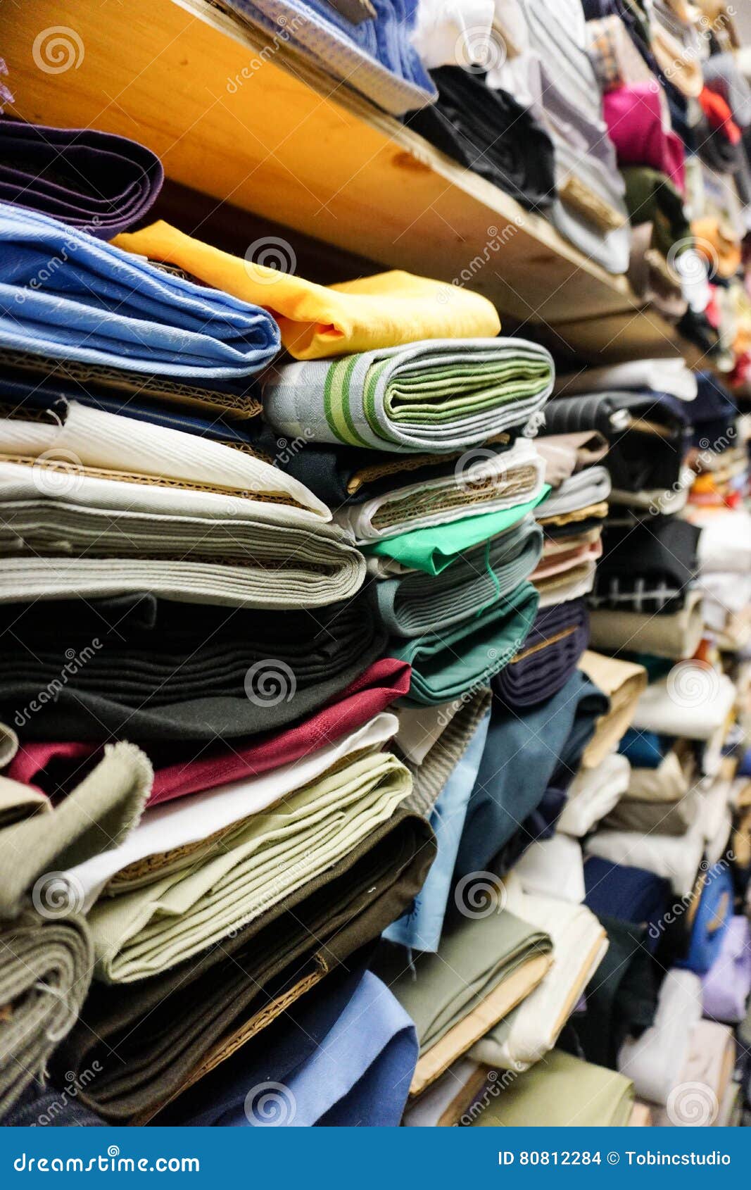 Fabric and Textile Rolls in Warehouse Stock Photo - Image of closeup ...