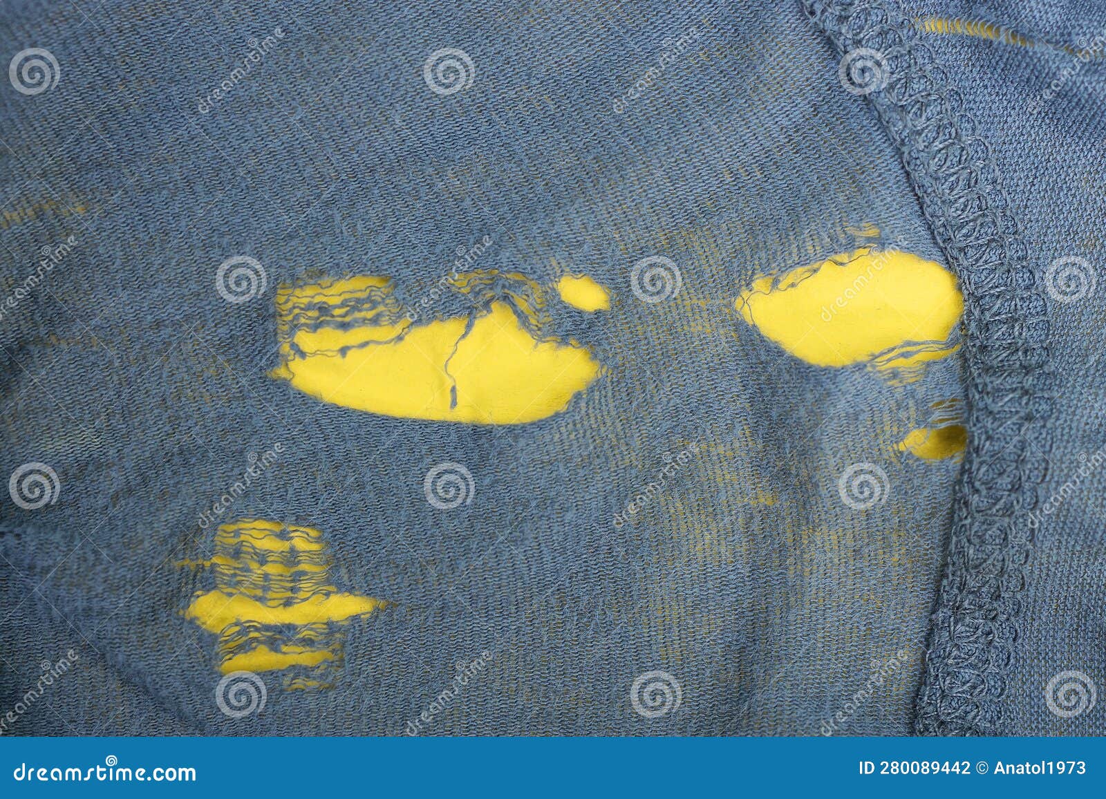 Fabric Texture of Torn Clothes with a Yellow Holes Stock Photo - Image ...