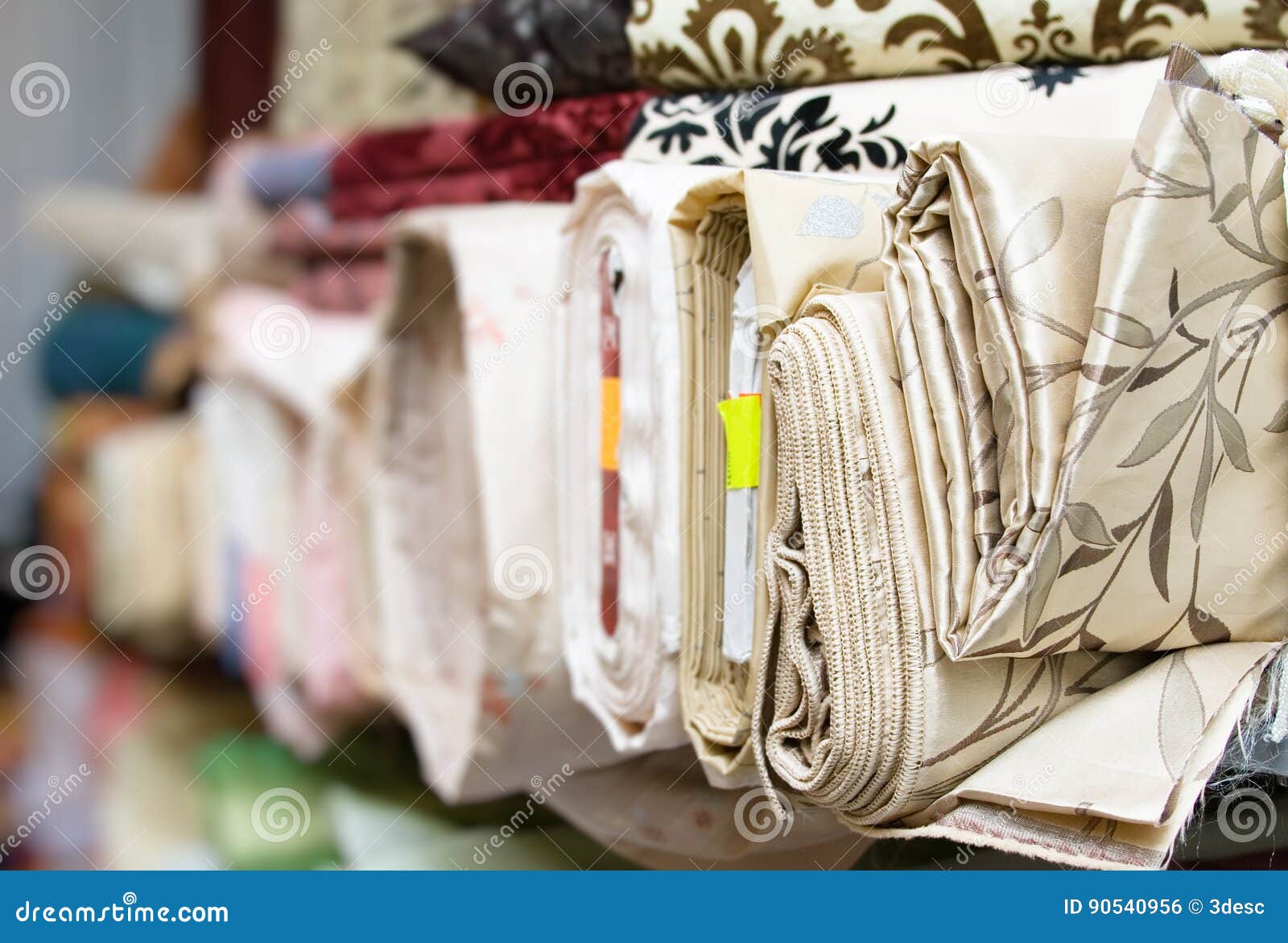 Fabric tubes Textile rolls stock photo. Image of pile - 90540956