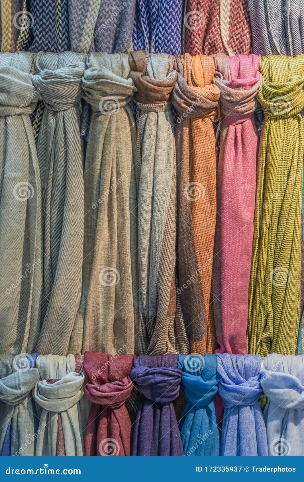 Fabrics of Different Colors and Textures Hang Vertically. Stock Image ...