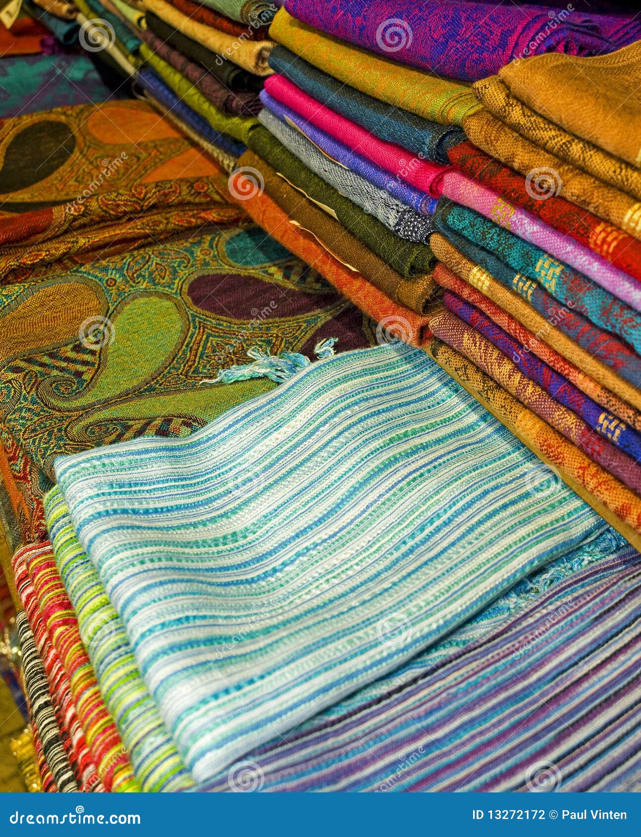 Fabrics on a market stall stock photo. Image of brown - 13272172