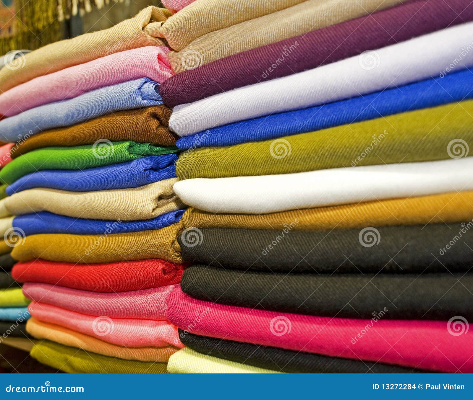Fabrics on a market stall stock photo. Image of brown - 13272284