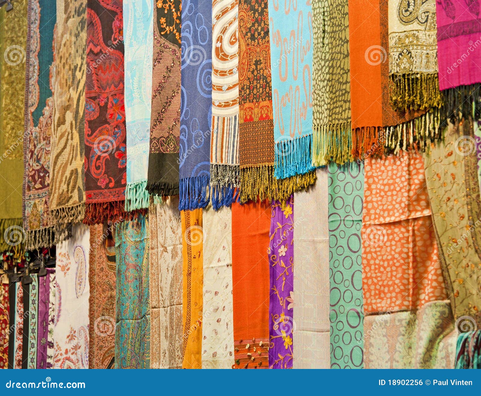 Fabrics at a market stall stock photo. Image of selection - 18902256
