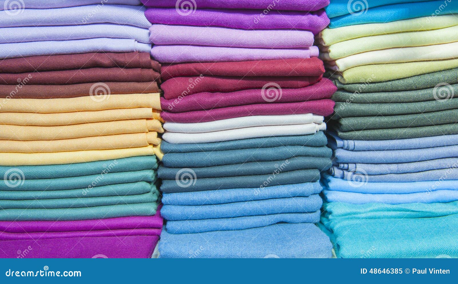 Fabrics at a market stall stock image. Image of folded - 48646385