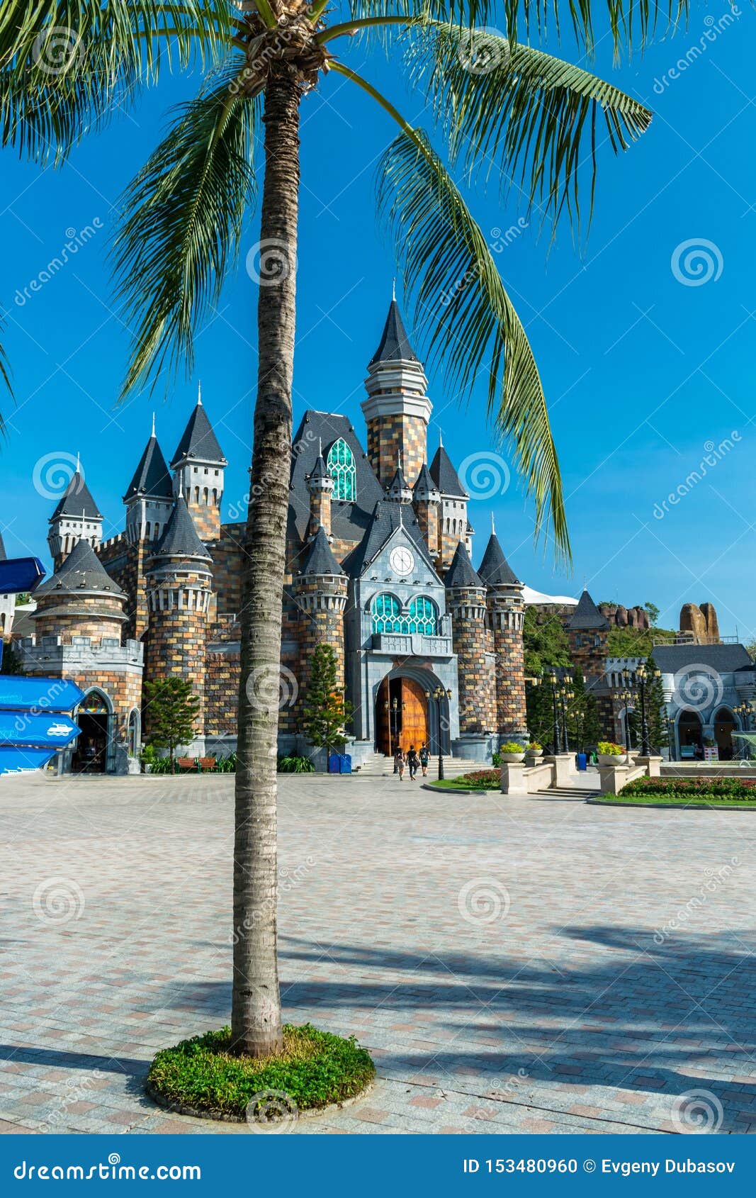 Fabulous Castle in a Amusement Park with Palm Under Sunlight Editorial ...