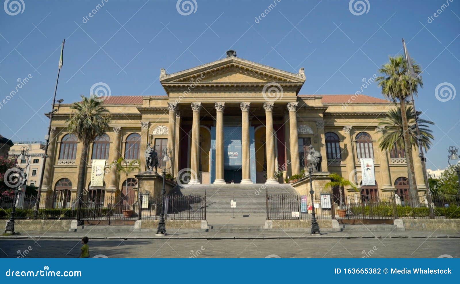 Facade of Ancient Building with Columns and Triangular Portico. Action ...