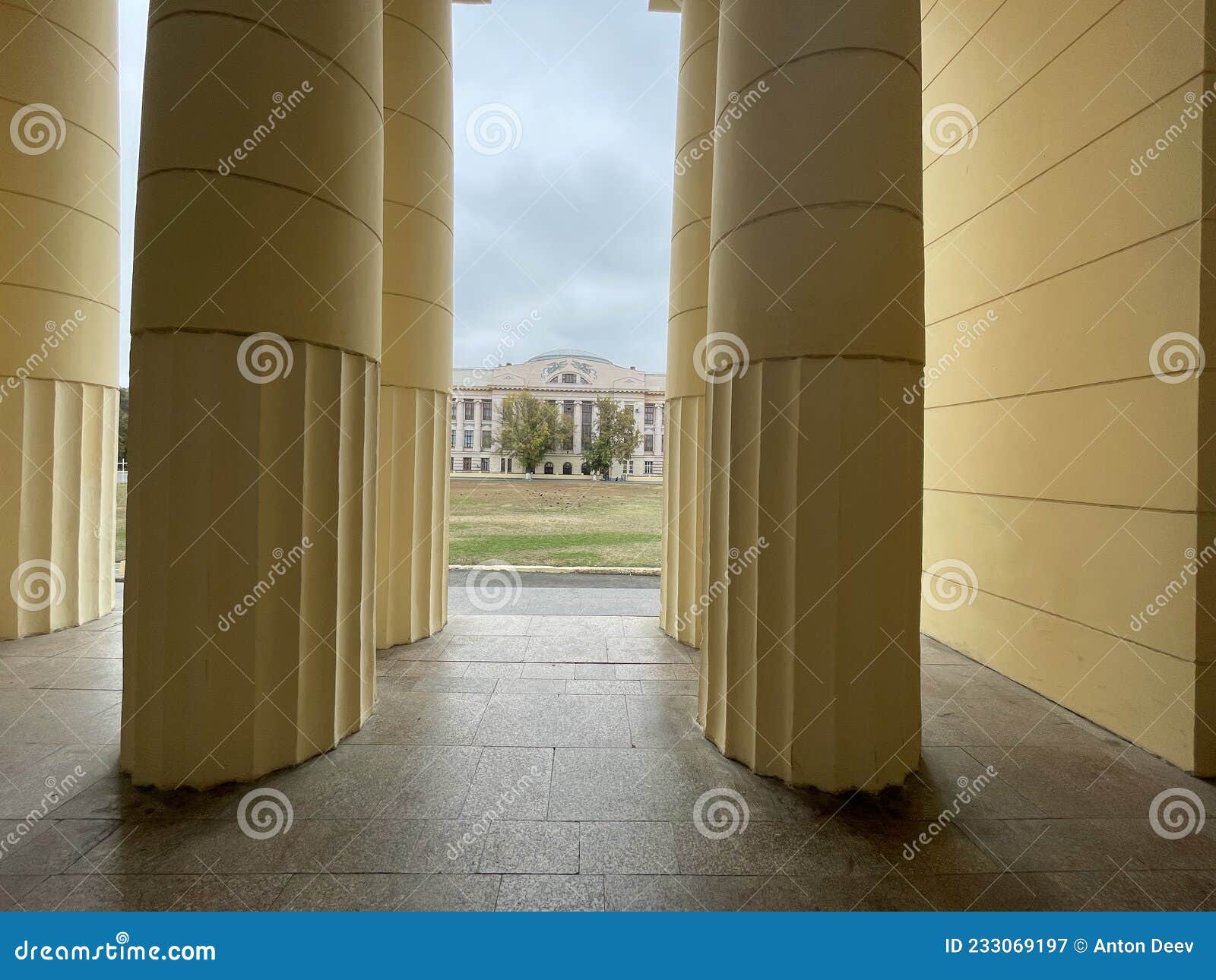Facade of Architectural Building through Columns. Historic House in ...