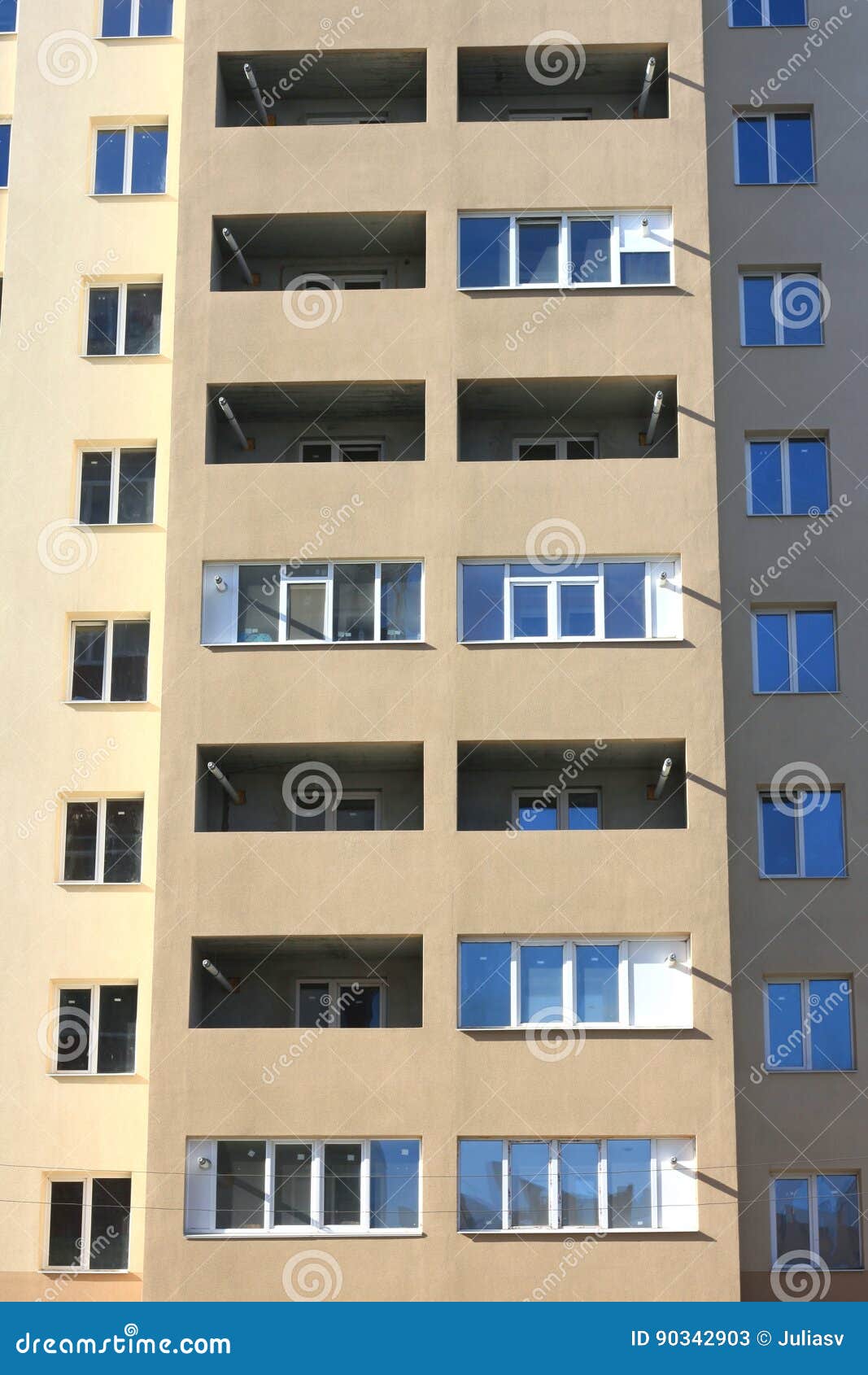 Facade of a Beautiful Multi-storey Modern Building with Windows and ...
