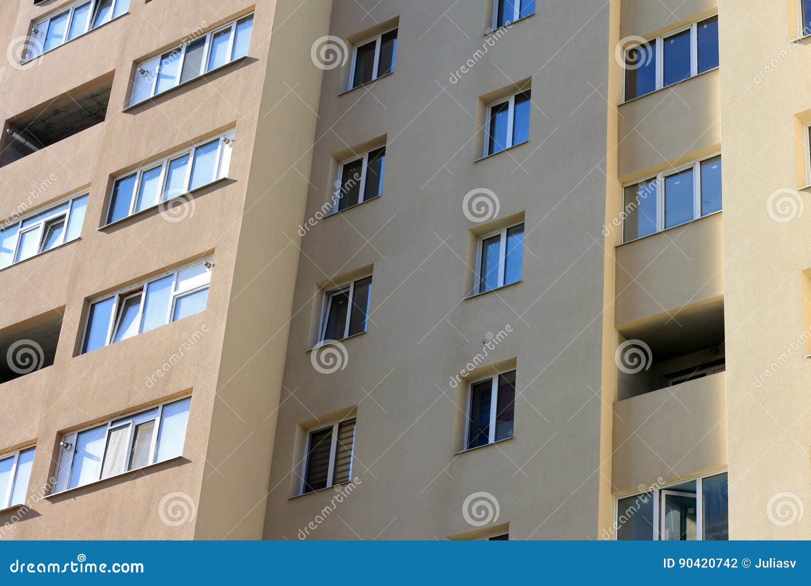 Facade of a Beautiful Multi-storey Modern Building with Windows and ...