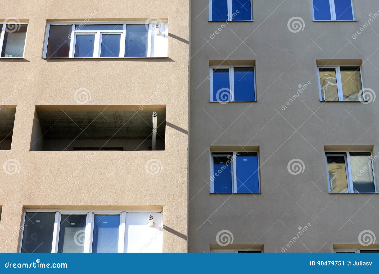 Facade of a Beautiful Multi-storey Modern Building with Windows and ...