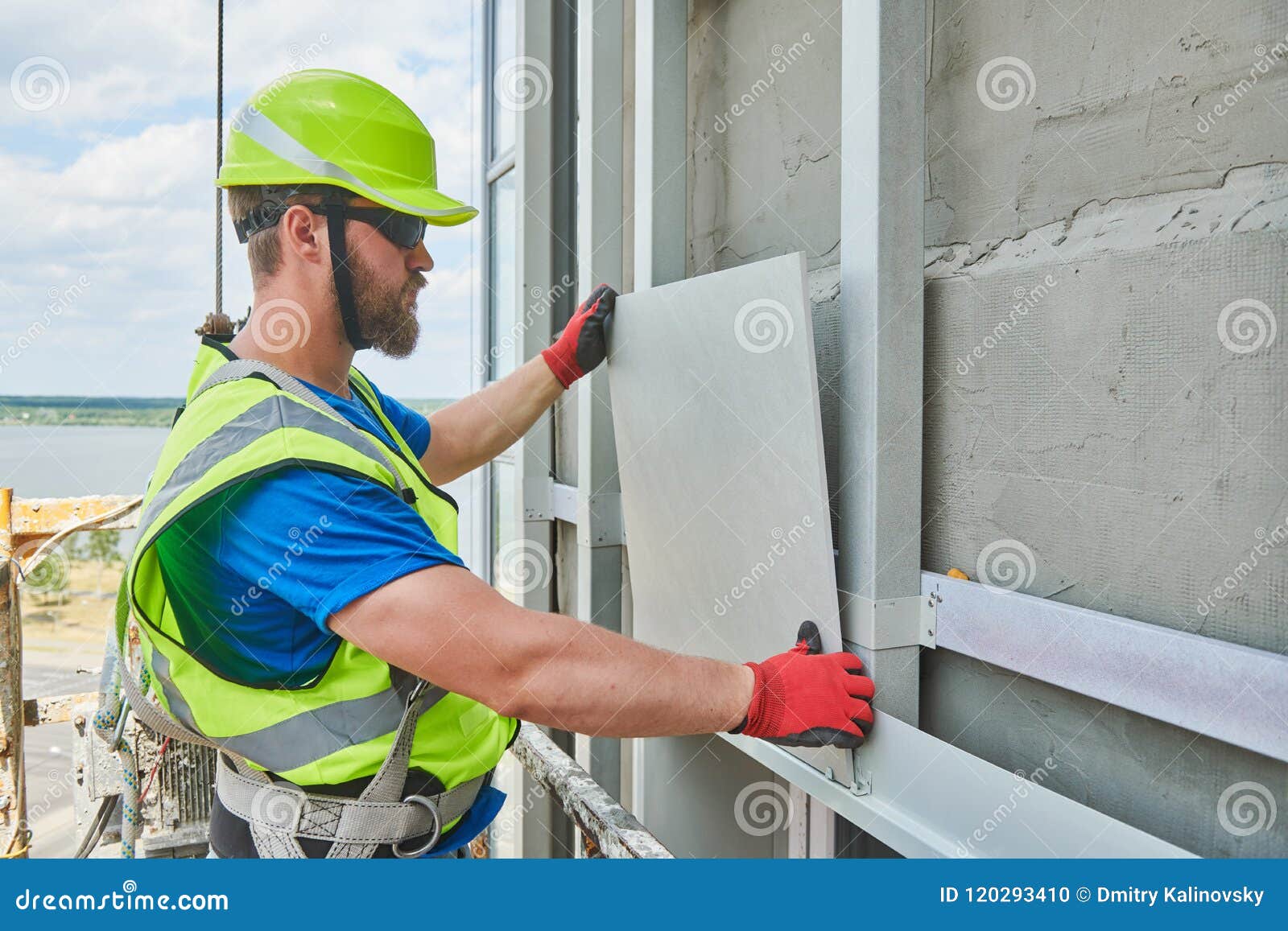 Facade Builder Installing Tile on Wall Stock Photo - Image of house ...