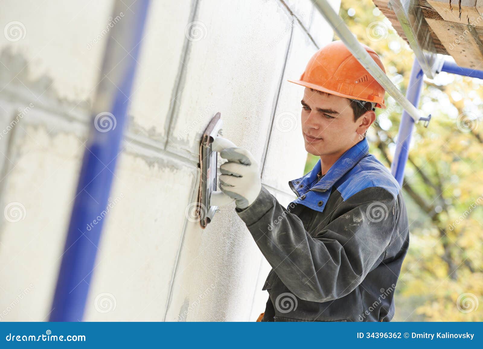 Facade Builder Plasterer at Work Stock Photo - Image of area ...