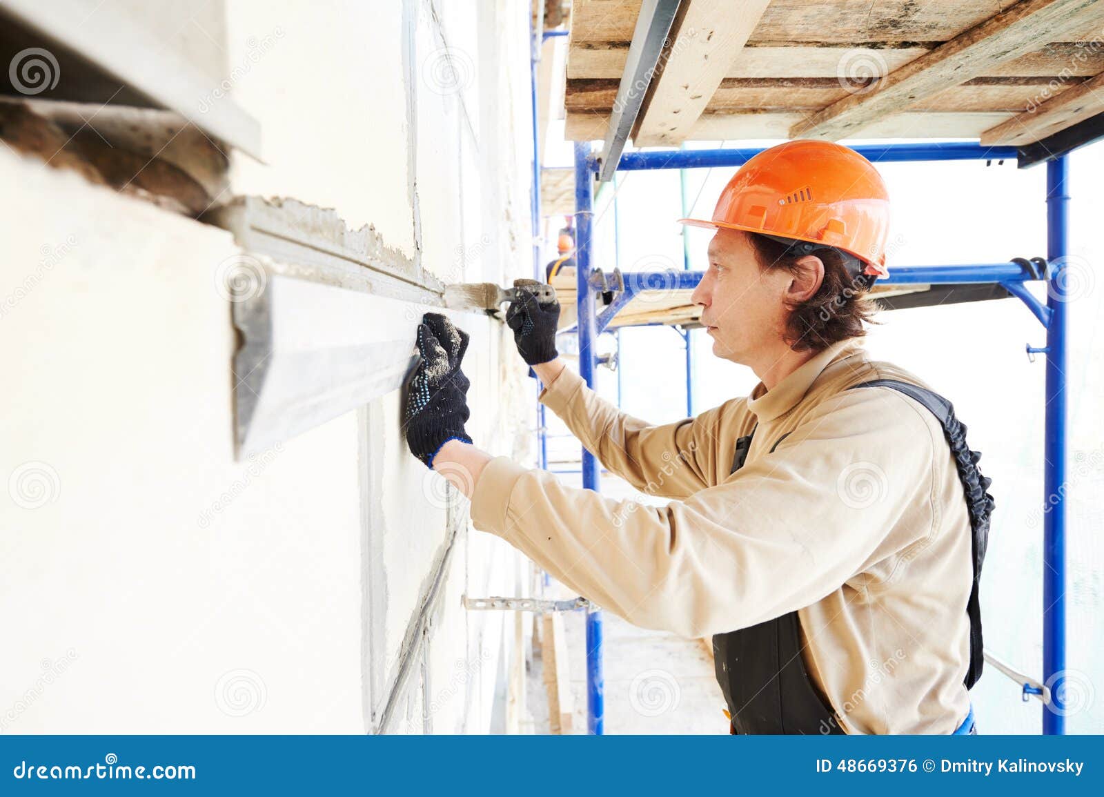 Facade Builder Plasterer at Work Stock Photo - Image of paint ...