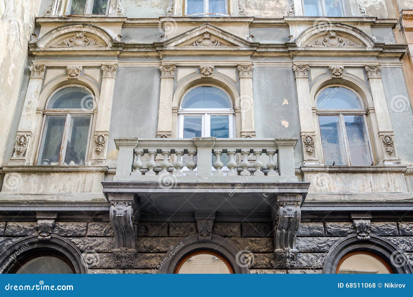Facade of a Building with Ancient Architecture with Windows and a ...
