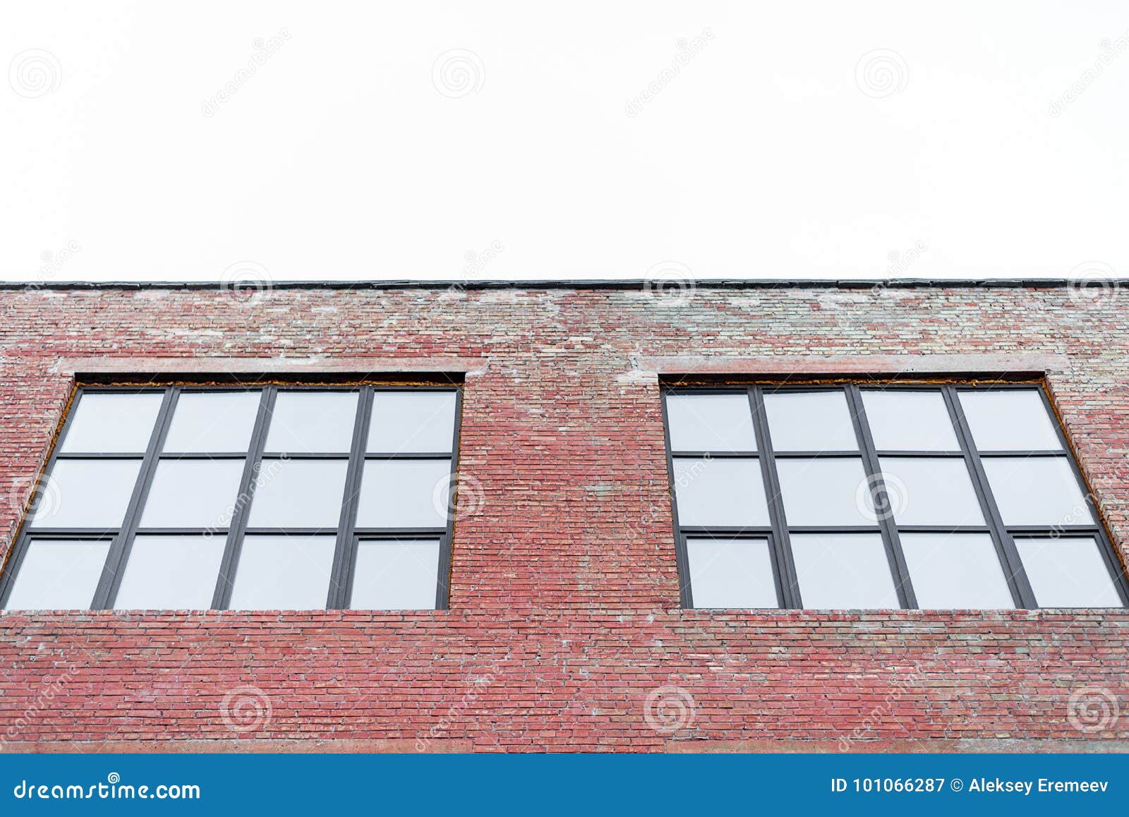 Facade of the Building with Large Square Windows Stock Image - Image of ...