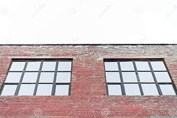 Facade of the Building with Large Square Windows Stock Image - Image of ...