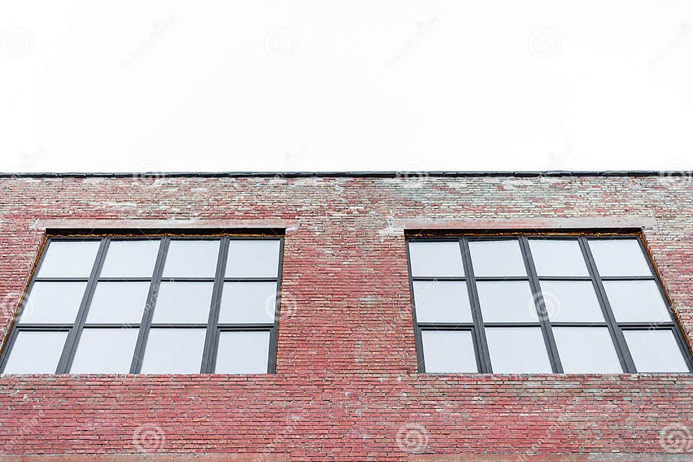 Facade of the Building with Large Square Windows Stock Image - Image of ...