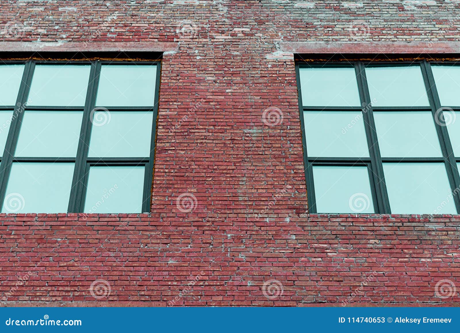 Facade of the Building with Large Square Windows Stock Image - Image of ...
