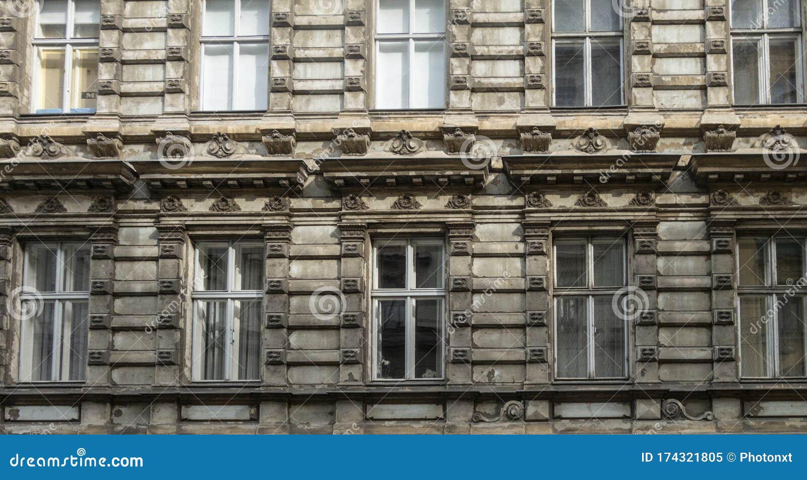 Facade of a Building with a Symmetrical Pattern of Windows Stock Image ...