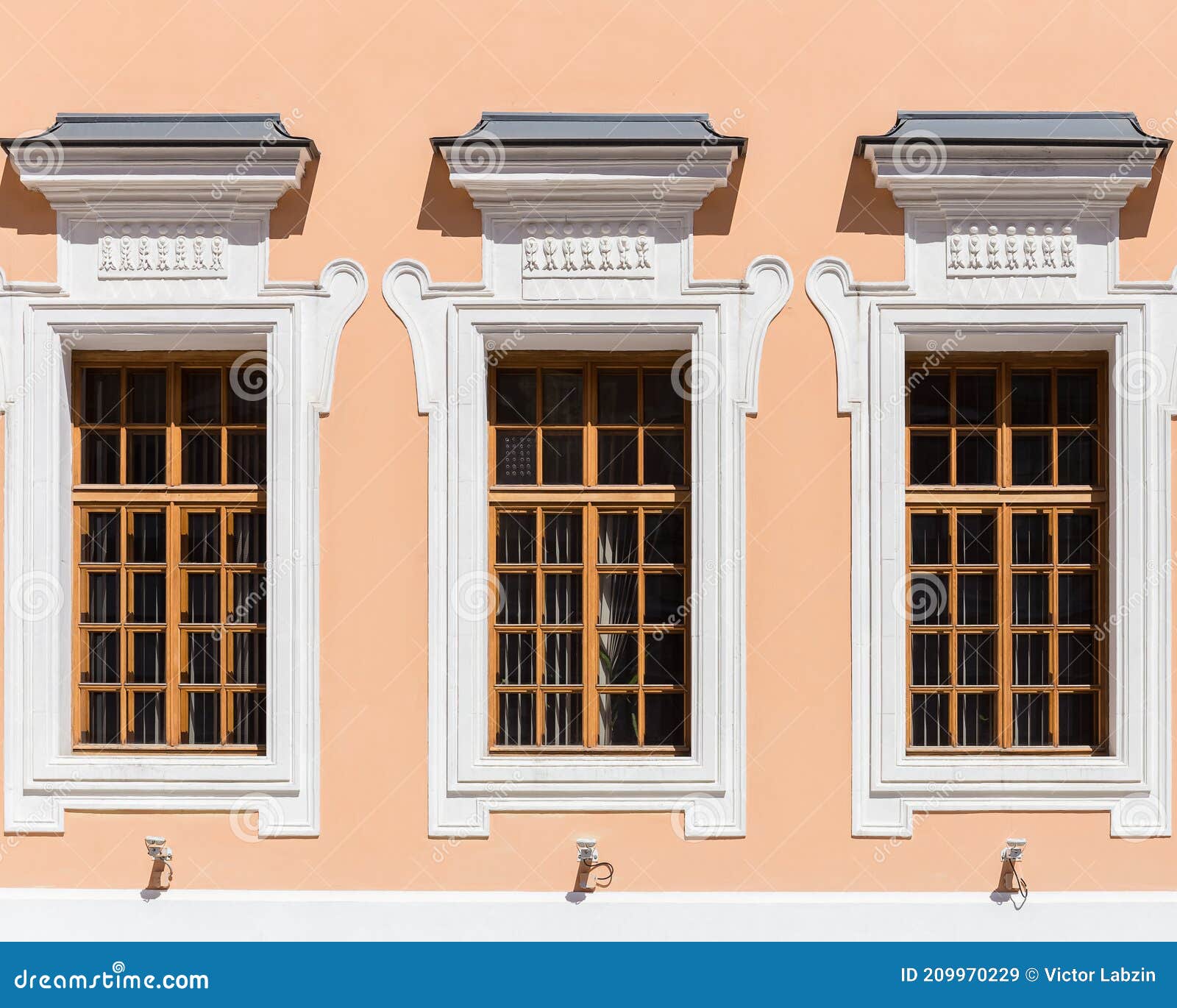 The Facade of the Building with Three Windows Stock Image - Image of ...
