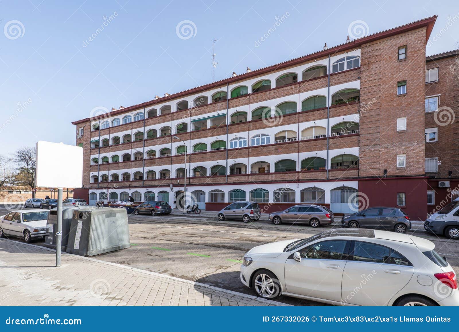 Facade of a Building with White Arches Combined with Clay Bricks Stock ...