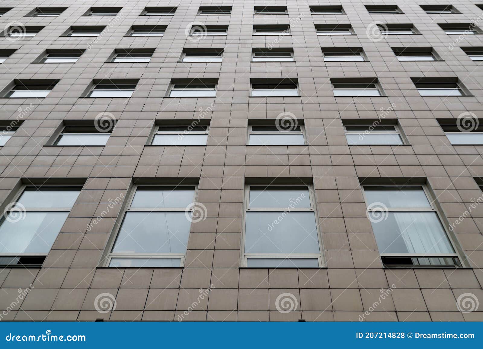 Facade of a Building with Windows. Texture for the Background. Stock ...
