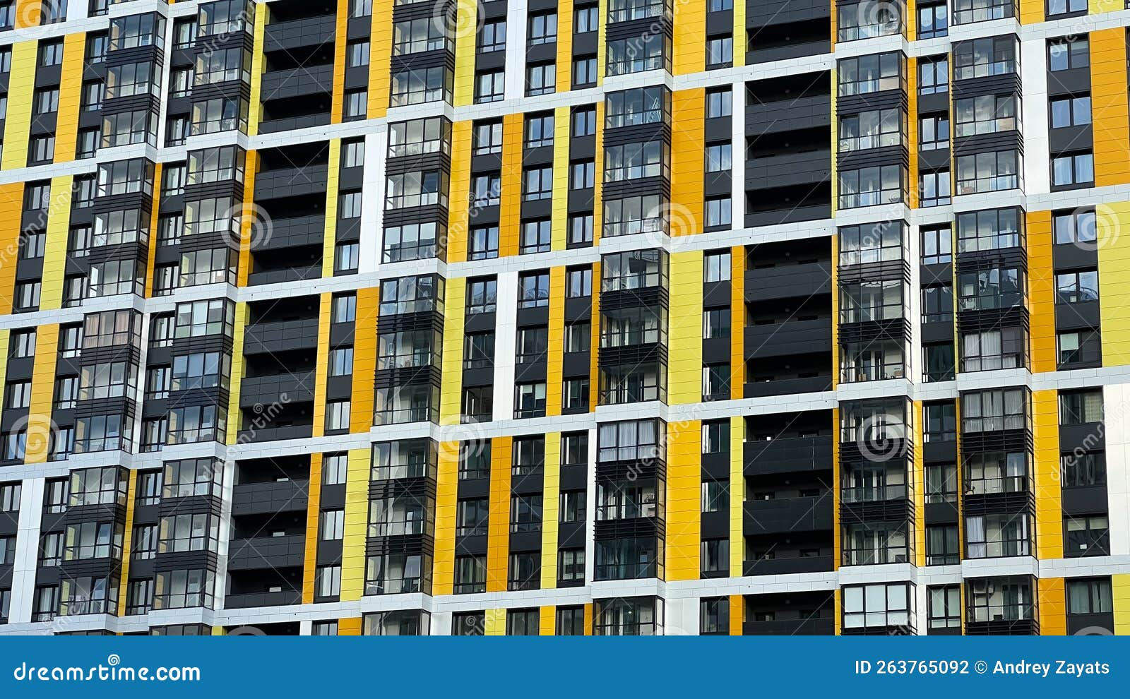 Facade of the Building in Yellow and Orange Colors, Geometric Patterns ...