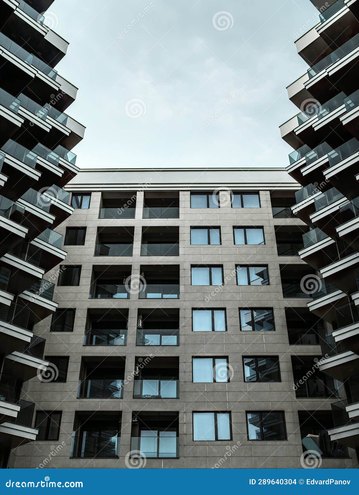 Facade through Buildings on Sides, with Angular Balconies with Glass ...