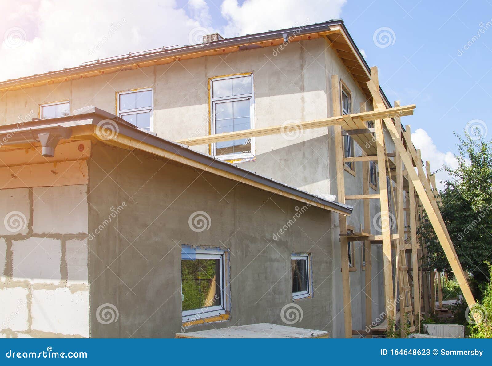 Facade of Cottage Under Construction Covered with Plaster with New ...