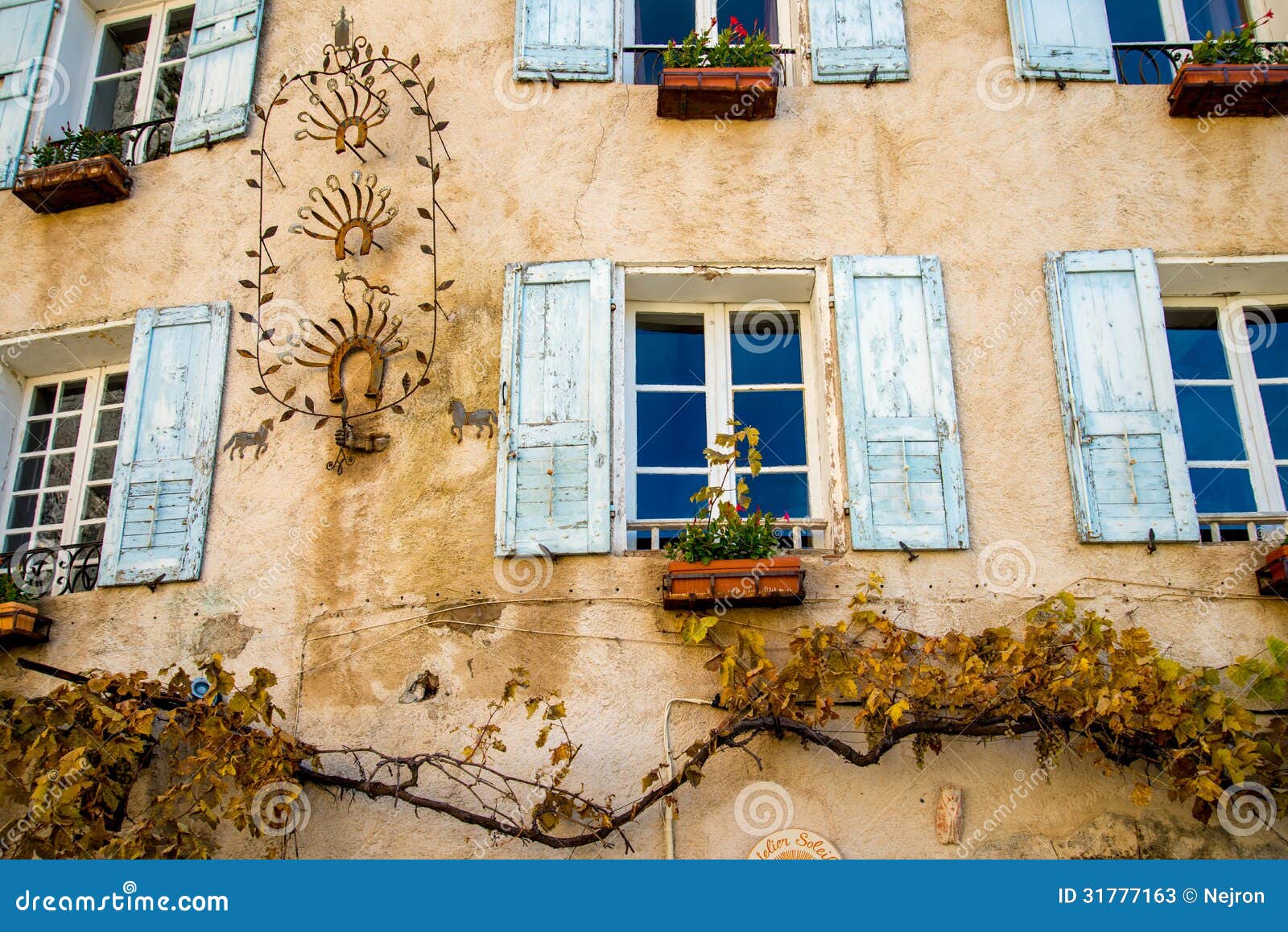 Facade Decorated with Flowers Stock Image - Image of front, house: 31777163