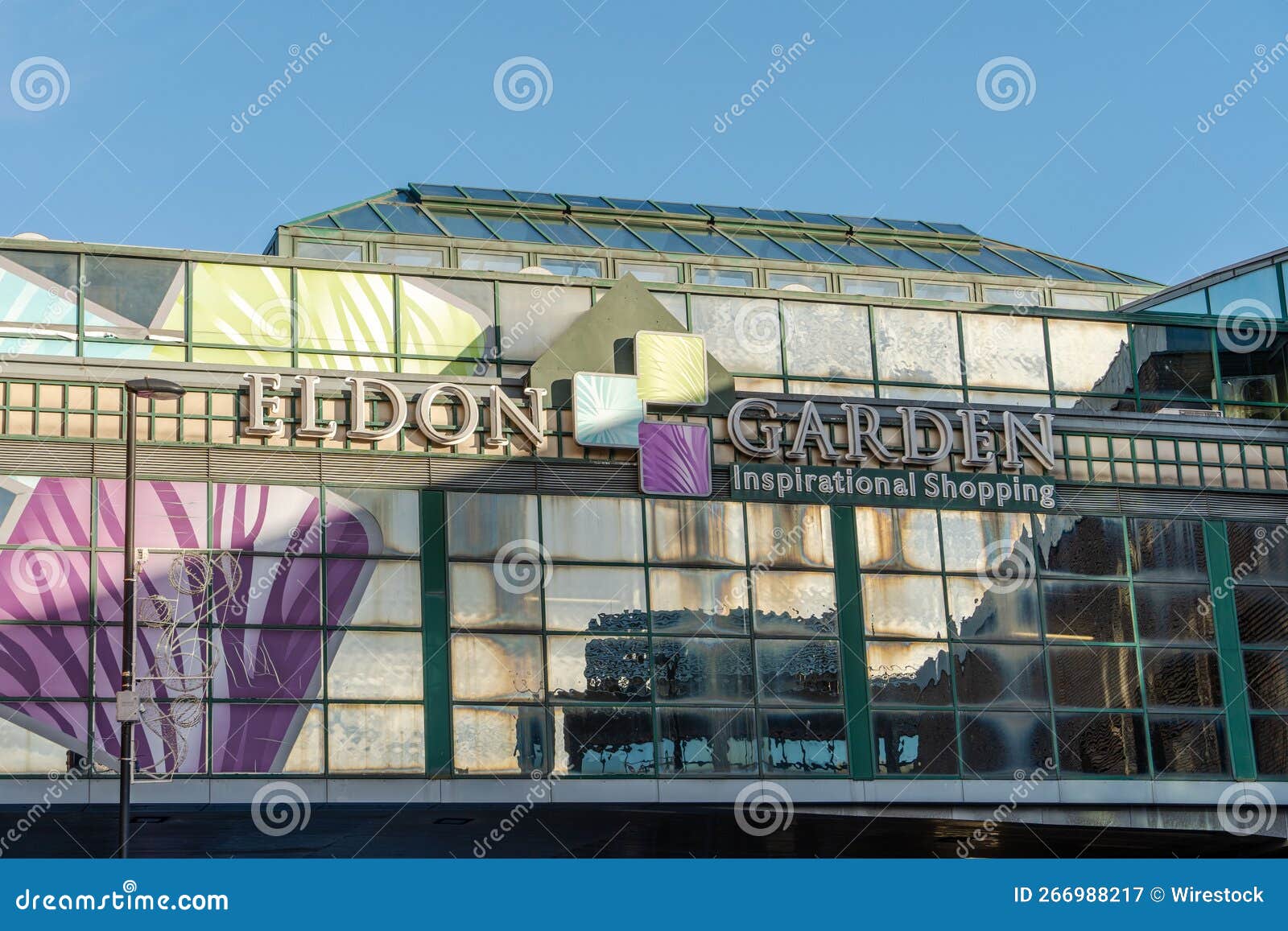 Facade of the Eldon Gardens Shopping Centre Building Against the Blue Sky in England Editorial ...