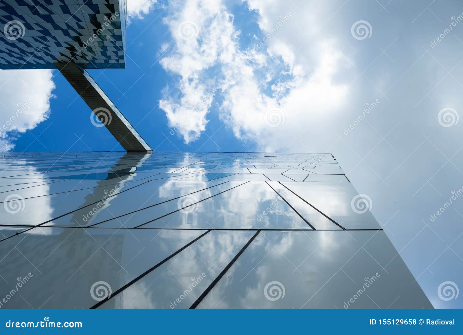 Facade of a Glass Building. Cloudy Sky Bottom View. Close-up Stock ...