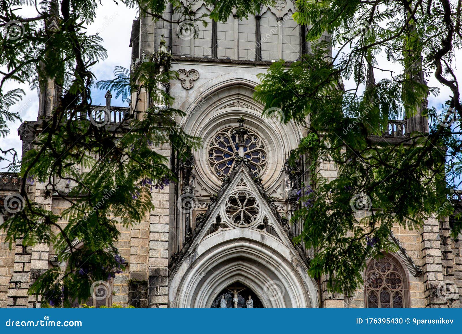Facade of a Gothic Cathedral in a Frame of Trees Stock Photo - Image of ...