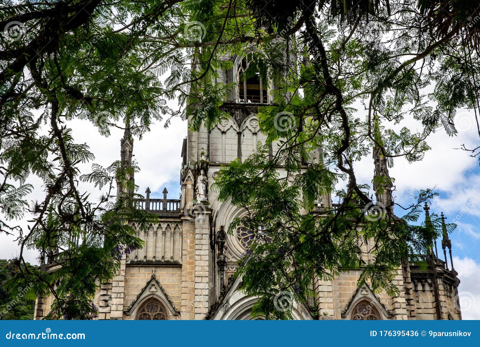 Facade of a Gothic Cathedral in a Frame of Trees Stock Photo - Image of ...