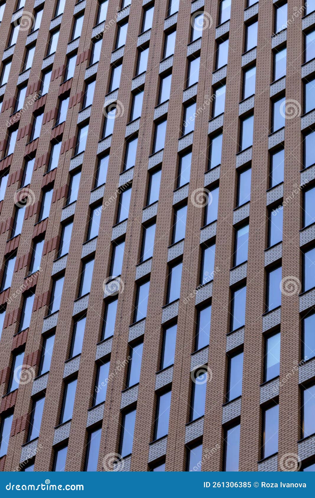 Facade of a High-rise Brick Building with Windows Stock Image - Image ...