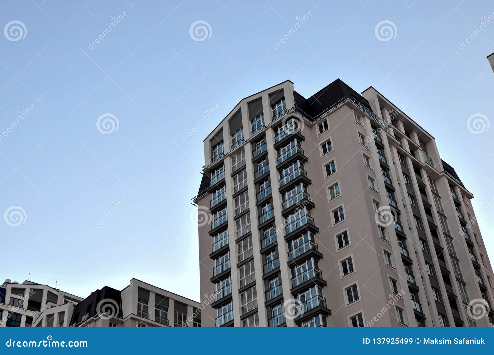 The Facade of a High-rise Building with Windows and Balconies. Stock ...