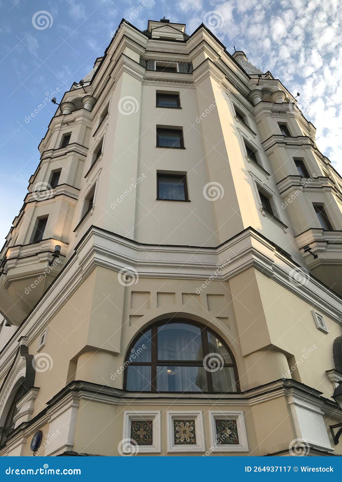 Facade of a High-rise Corner Building Stock Image - Image of window ...
